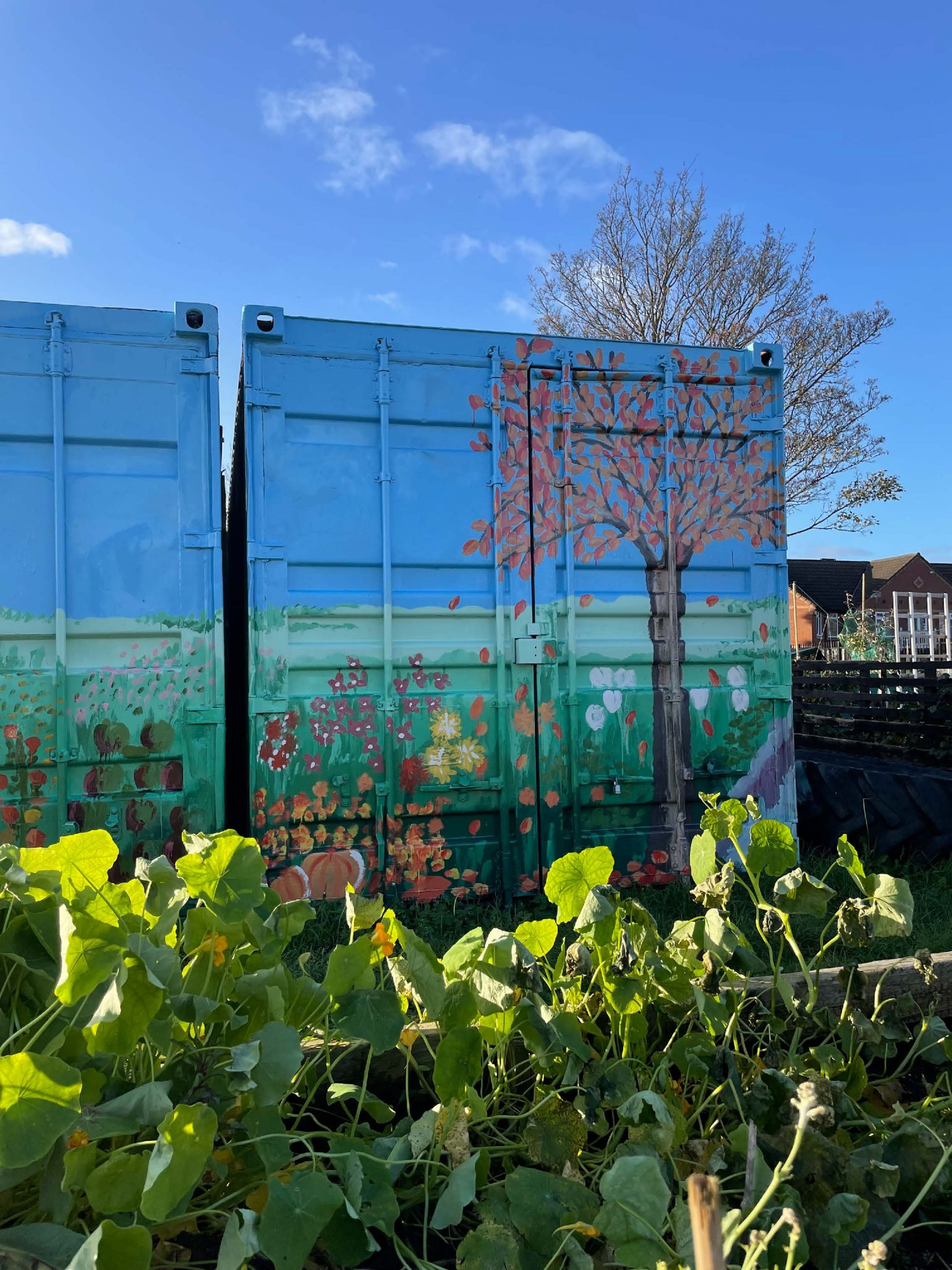 Ukrainian refugees create mural using leftover paint from Community ...
