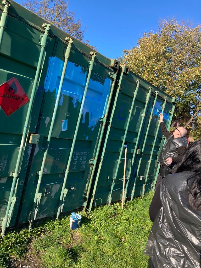 Ukrainian refugees create mural using leftover paint from Community ...